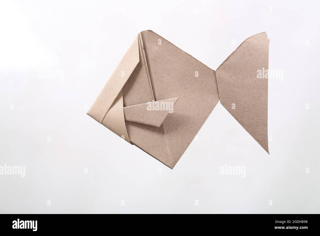 Origami Fish papercraft by recycle paper isolated in white background ...