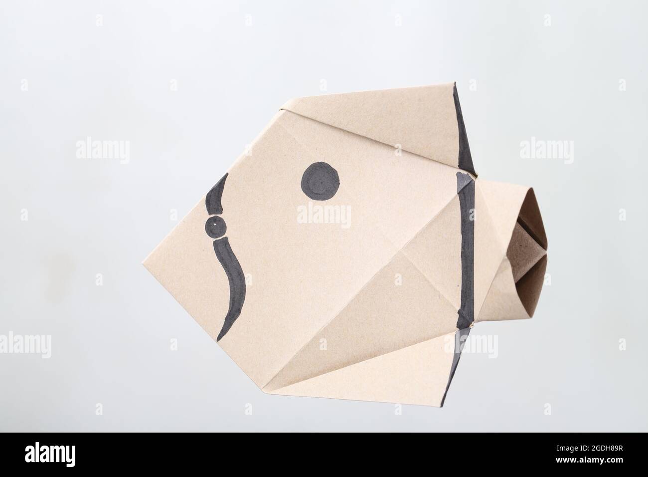 Origami Fish papercraft by recycle paper isolated in white background ...