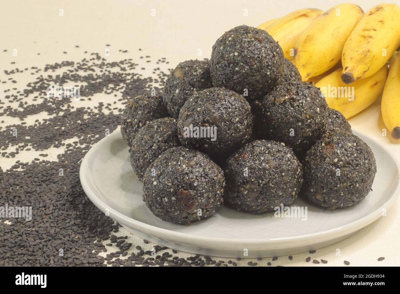 Traditional Indian sweet balls made with sesame seeds, jaggery and ...