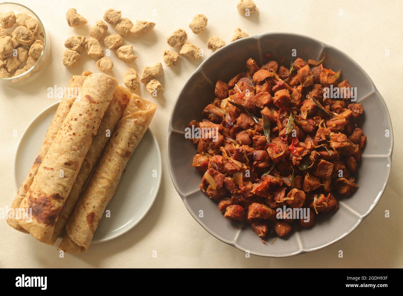 Dry roasted soya chunks with onions tomatoes and spices. Prepared with ...
