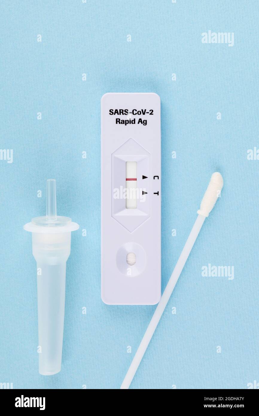 Negative covid 19 test on blue backround. Corona nasal swab test Stock ...