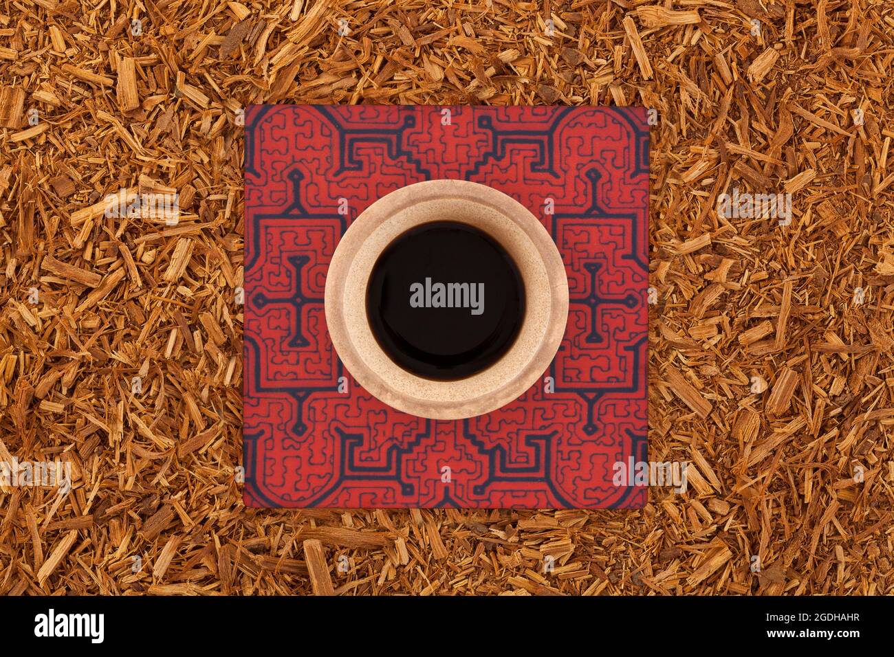 Ayahuasca background. Shredded banisteriopsis caapi vine, yagé brew and ...