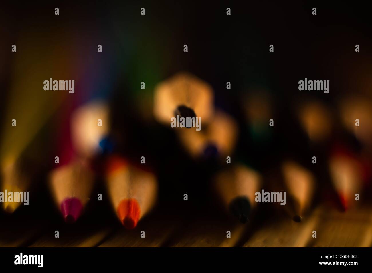 Closeup shot of sharp colorful pencils on a wooden surface Stock Photo ...