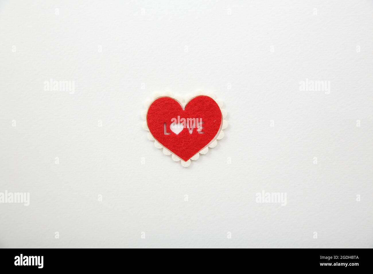 Cute love paper sign craft isolated in white background Stock Photo - Alamy