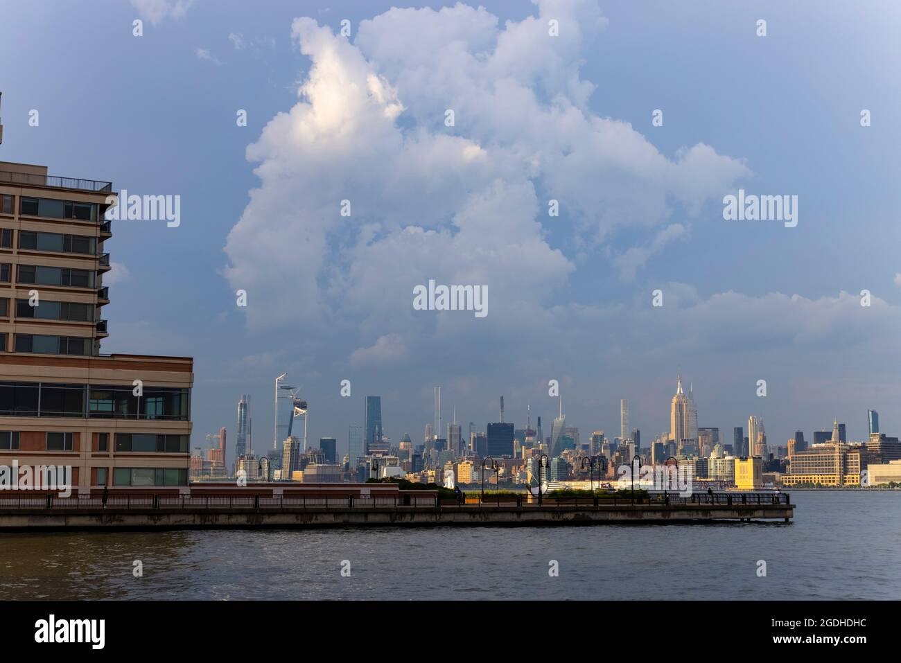 Summer clouds float over the Midtown Manhattan skyscraper in Manhattan ...
