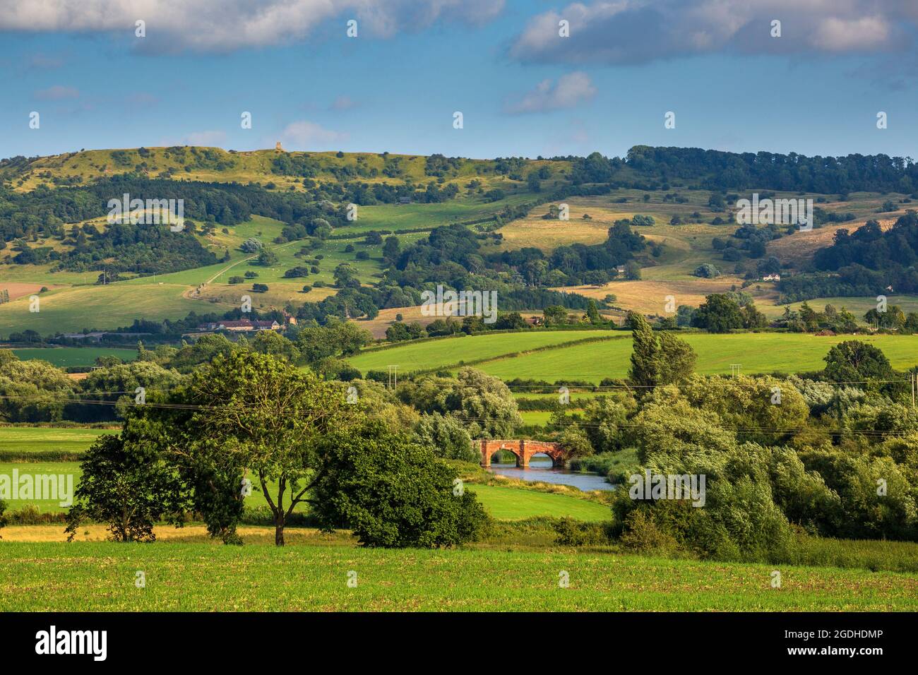 A view of Bredon HIll with Parson's Folly and Eckington Bridge ...