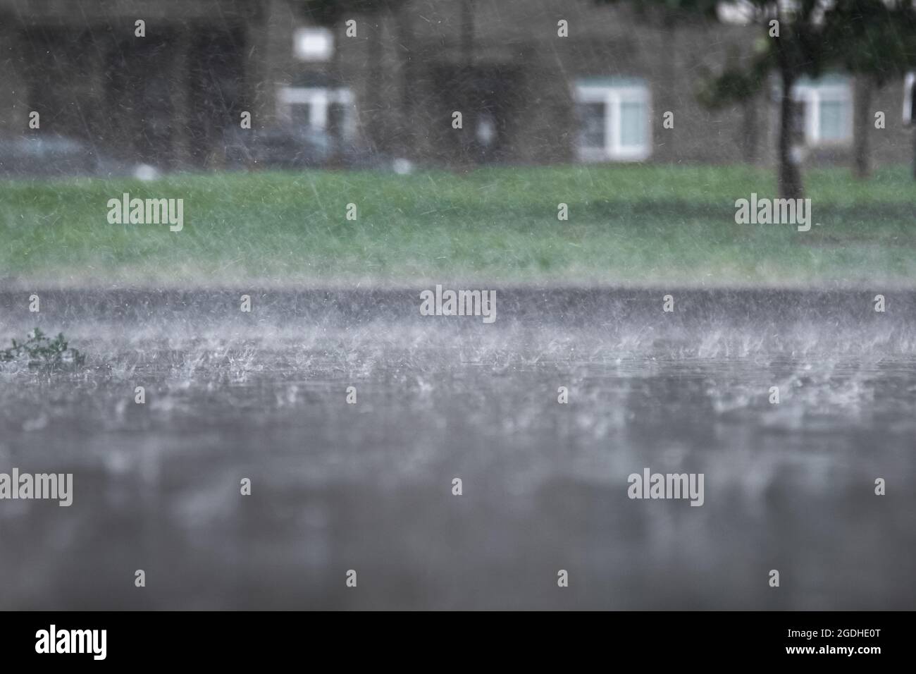 Heavy rain, close-up of splashing and flying drops with an inverted ...