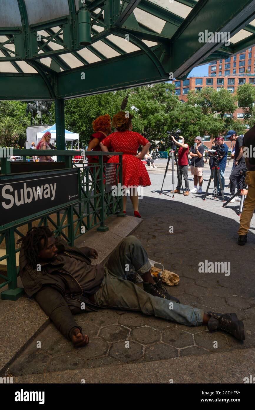 NEW YORK, USA – JUNE 16: Young homeless man lays down at entrance of ...