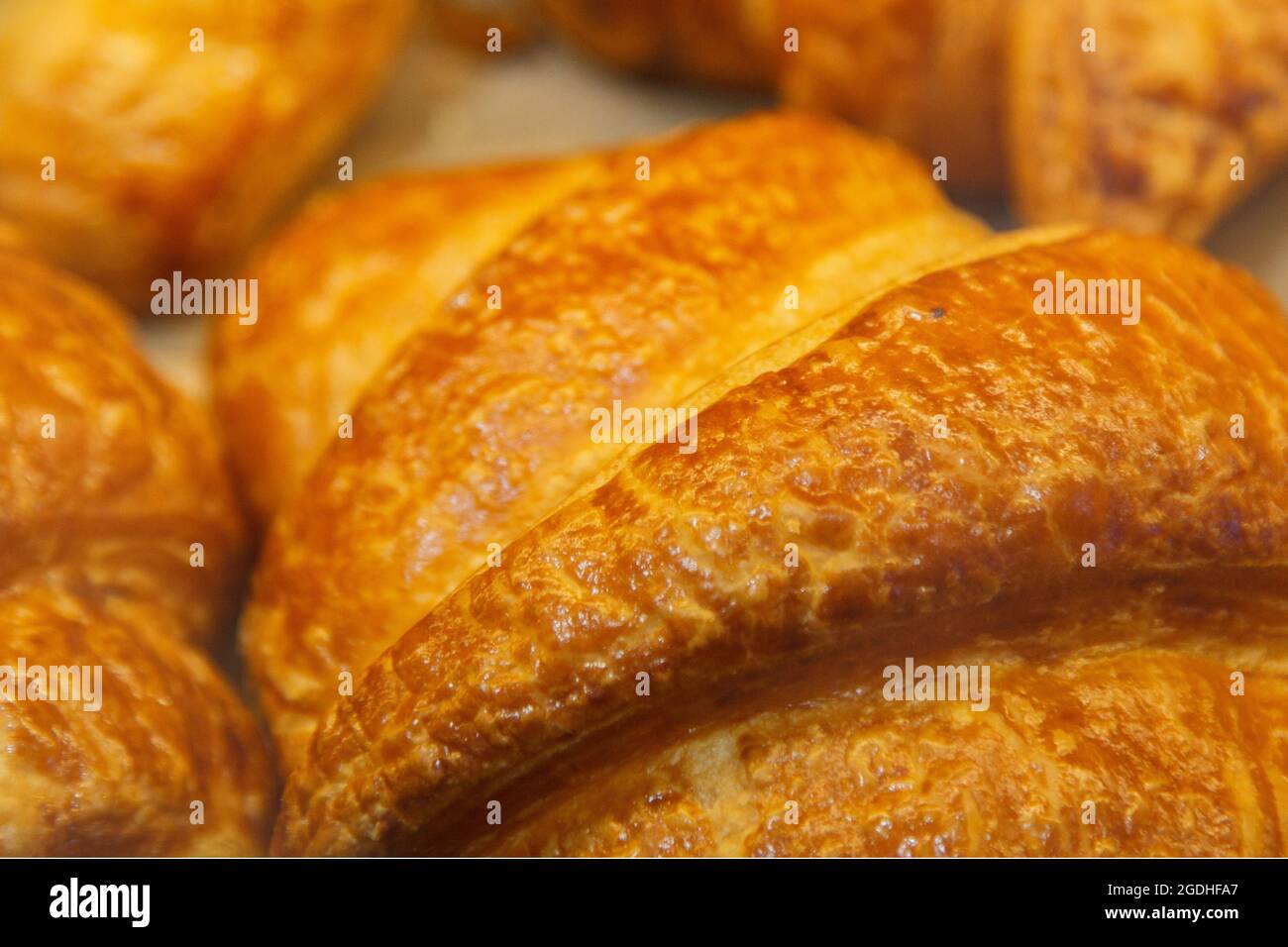 Baking croissants warm color, macro Stock Photo - Alamy