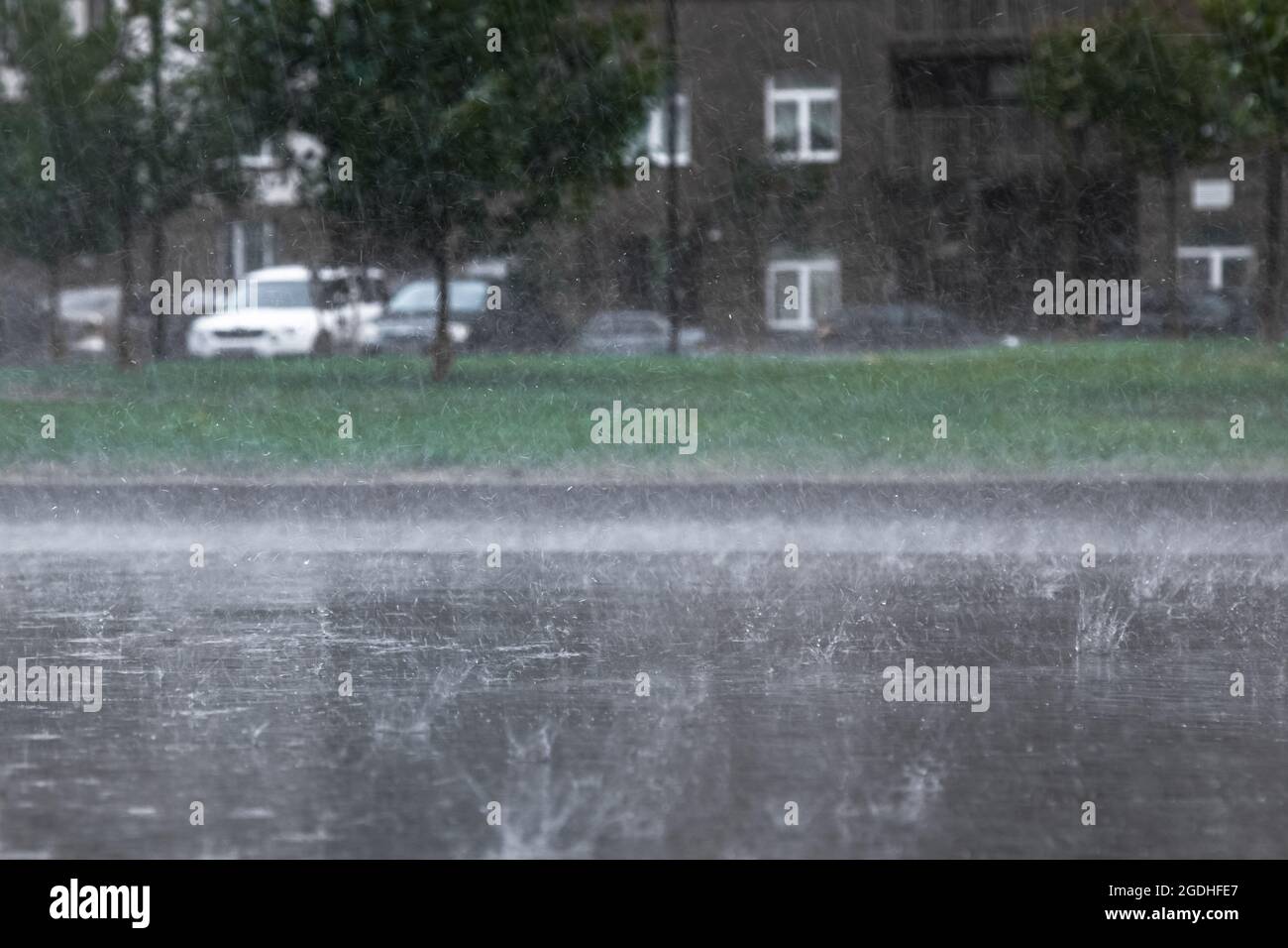 Heavy rain, close-up of splashing and flying drops with an inverted ...