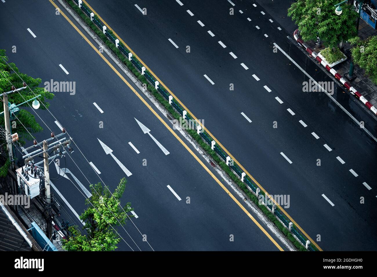 Above of two way asphalt highway road with arrows traffic sign in the ...