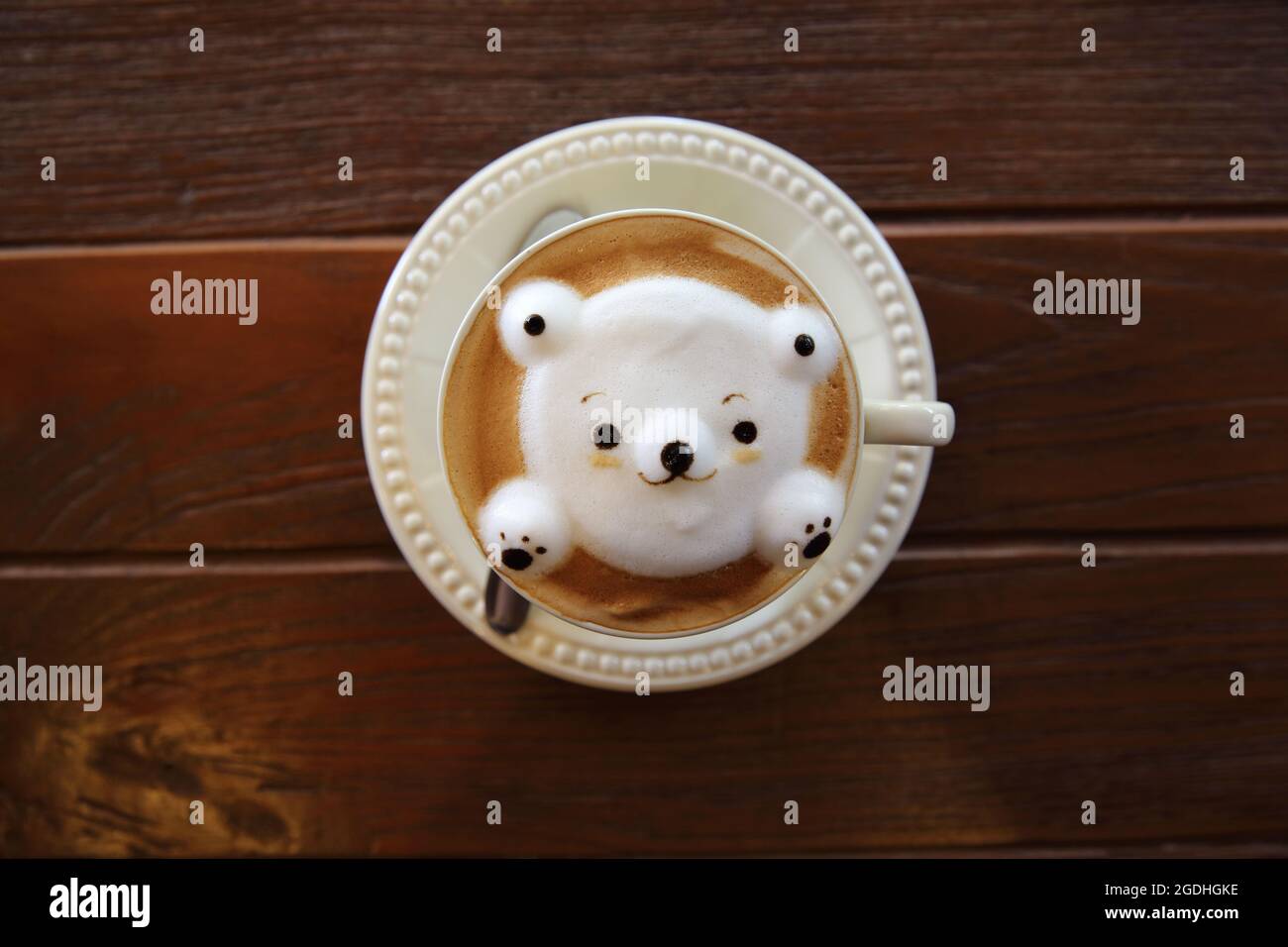 Latte art bear on wooden hi-res stock photography and images - Alamy