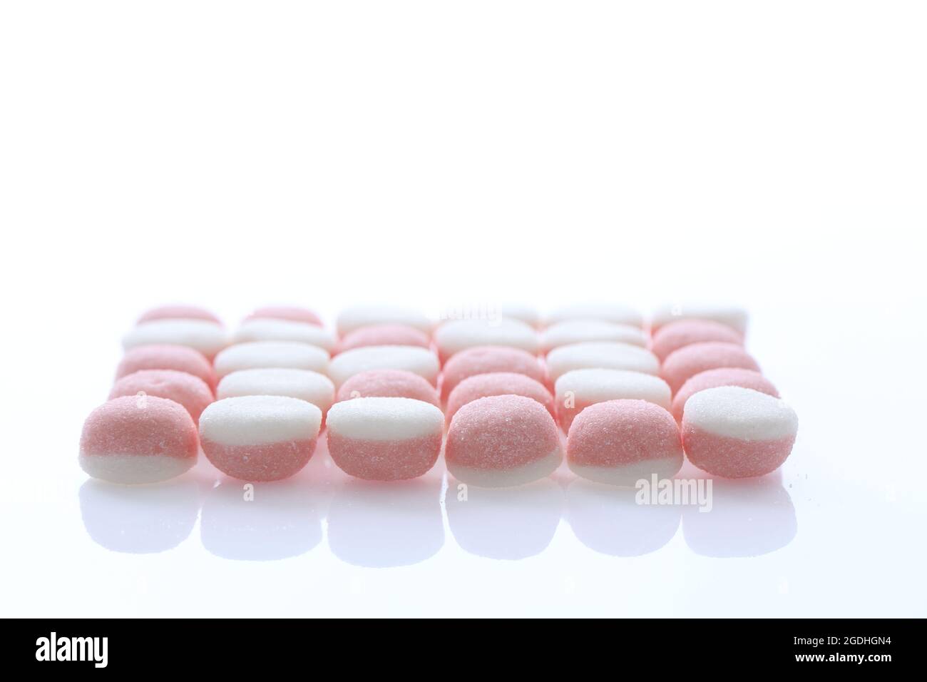 pink jelly candy isolated in white background Stock Photo - Alamy