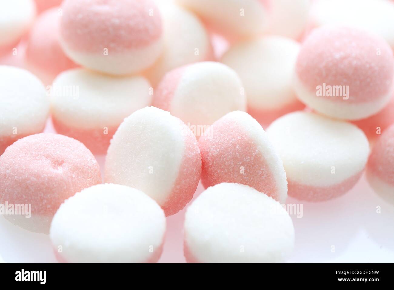 pink jelly candy isolated in white background Stock Photo - Alamy