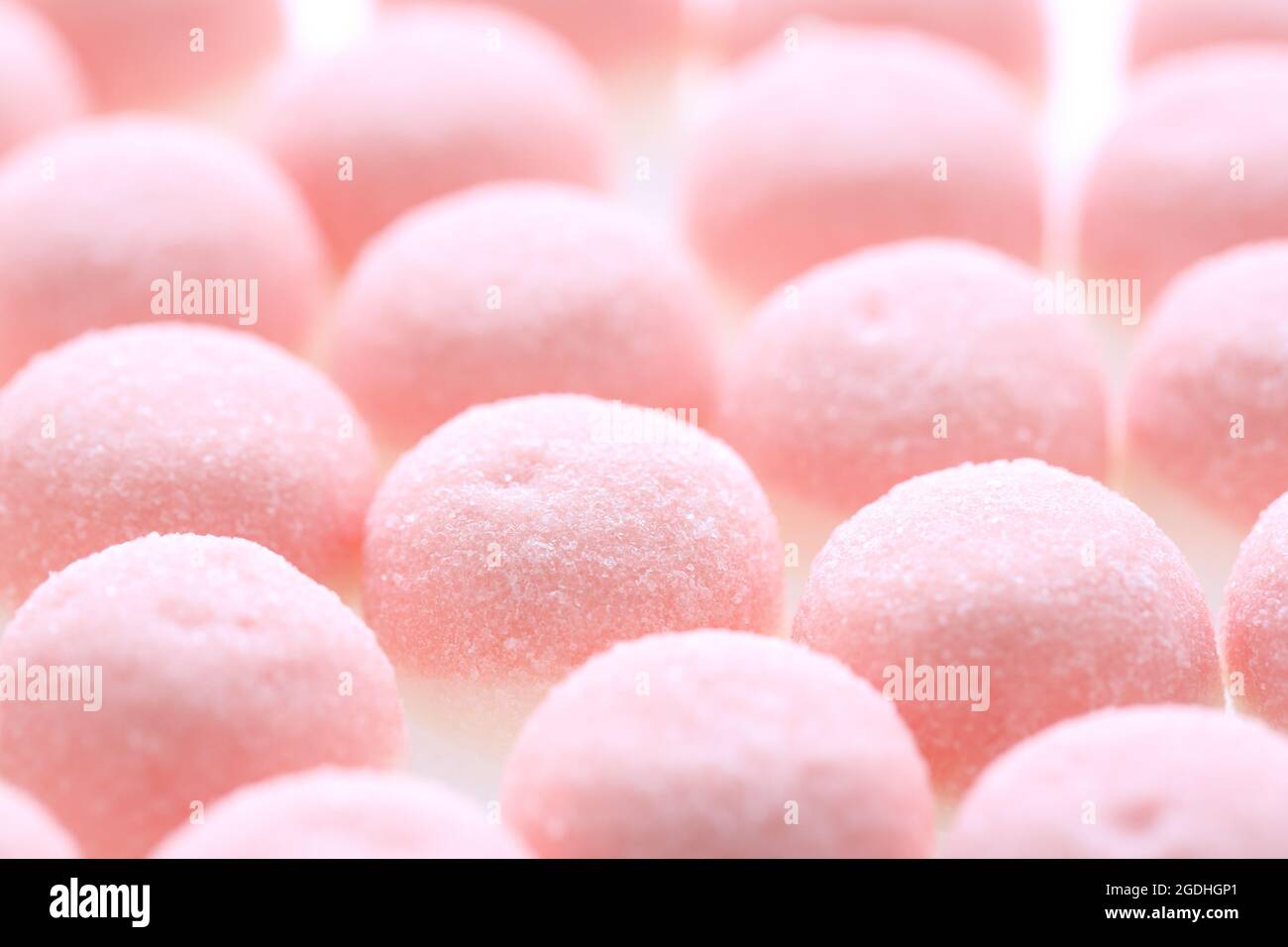 pink jelly candy isolated in white background Stock Photo - Alamy
