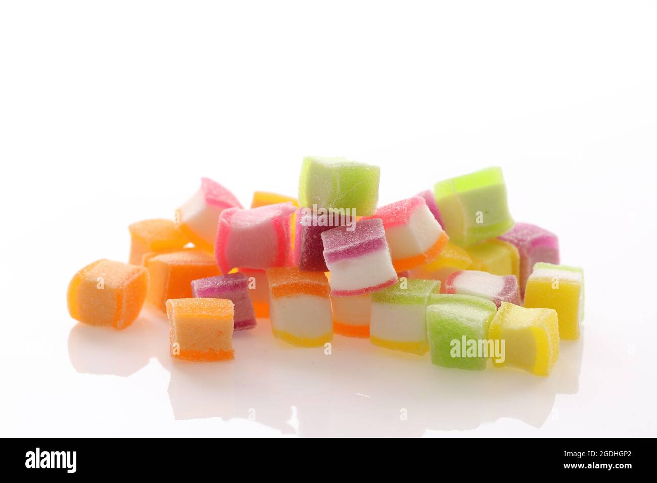 Colorful cube jelly candy isolated in white background Stock Photo - Alamy