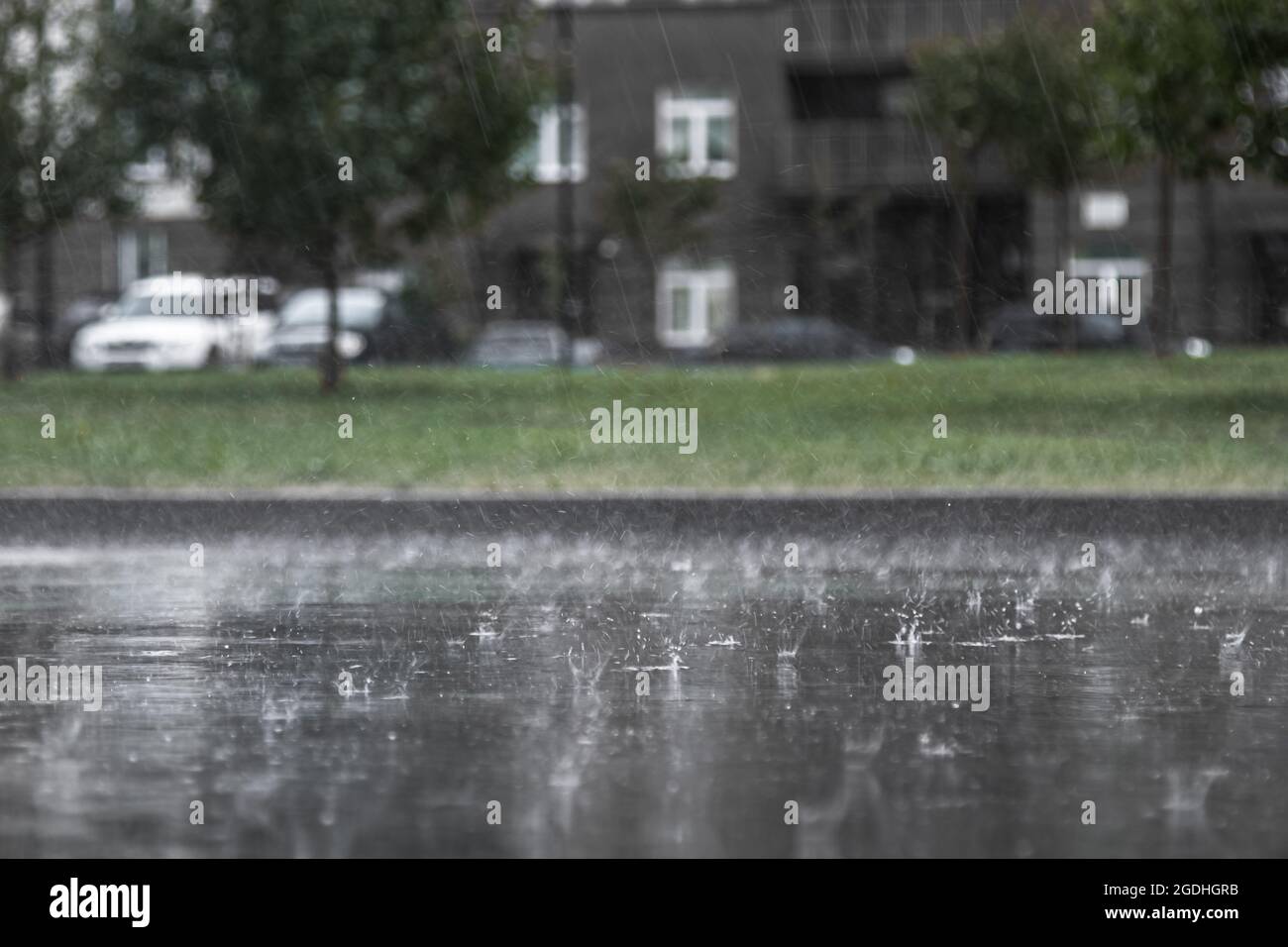 Heavy rain, close-up of splashing and flying drops with an inverted ...