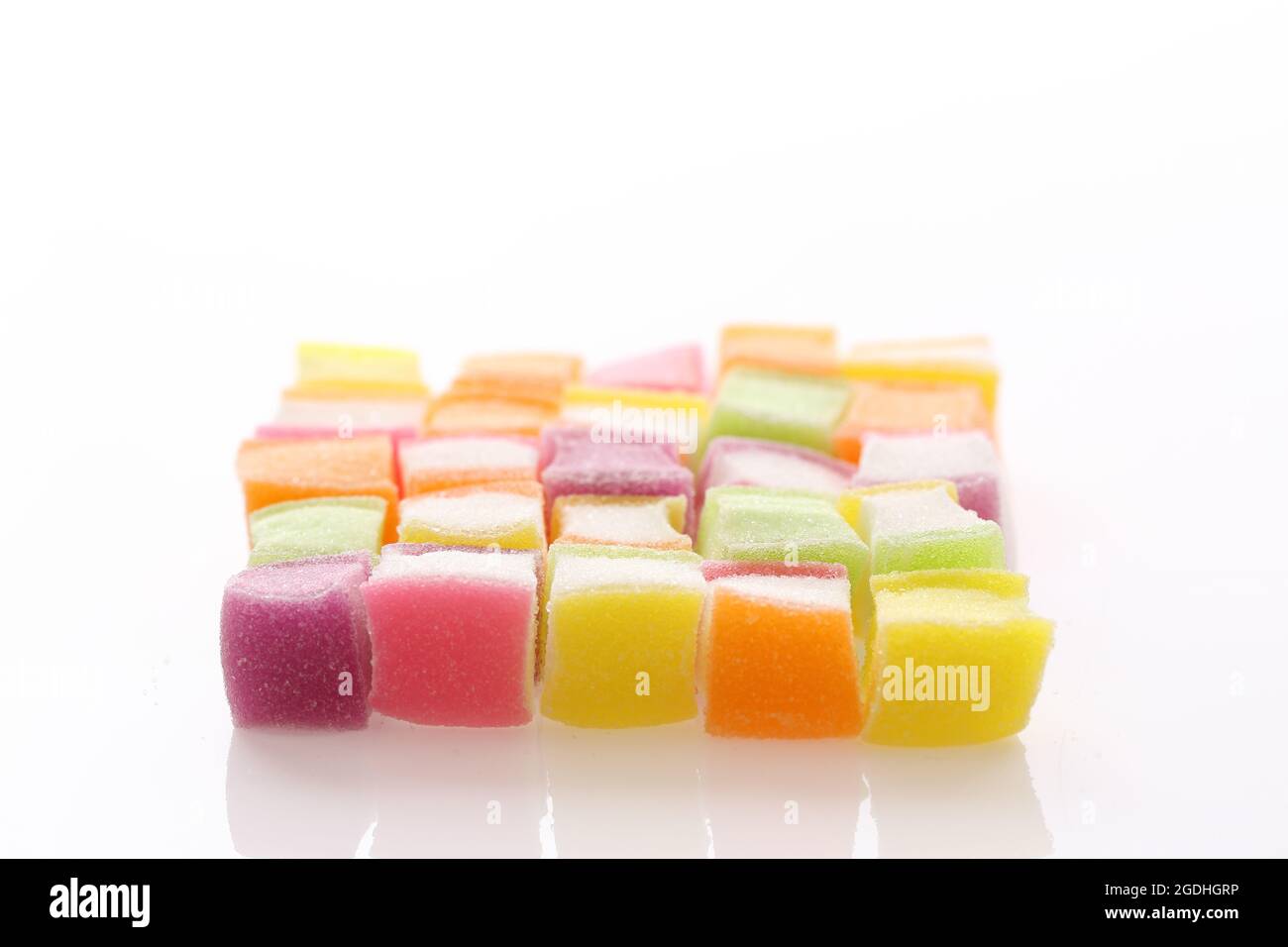 Colorful cube jelly candy isolated in white background Stock Photo - Alamy