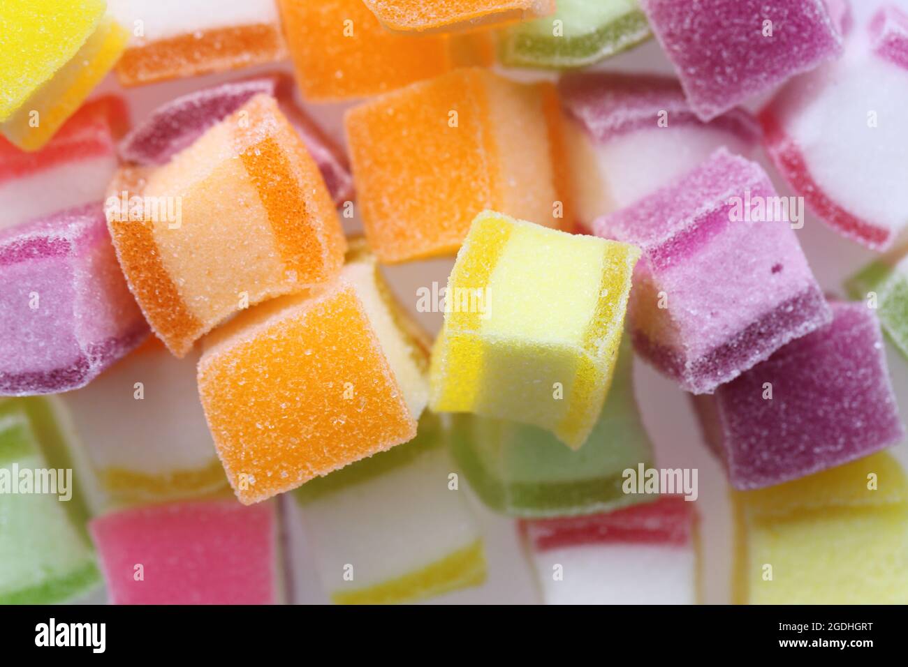 Colorful cube jelly candy isolated in white background Stock Photo - Alamy