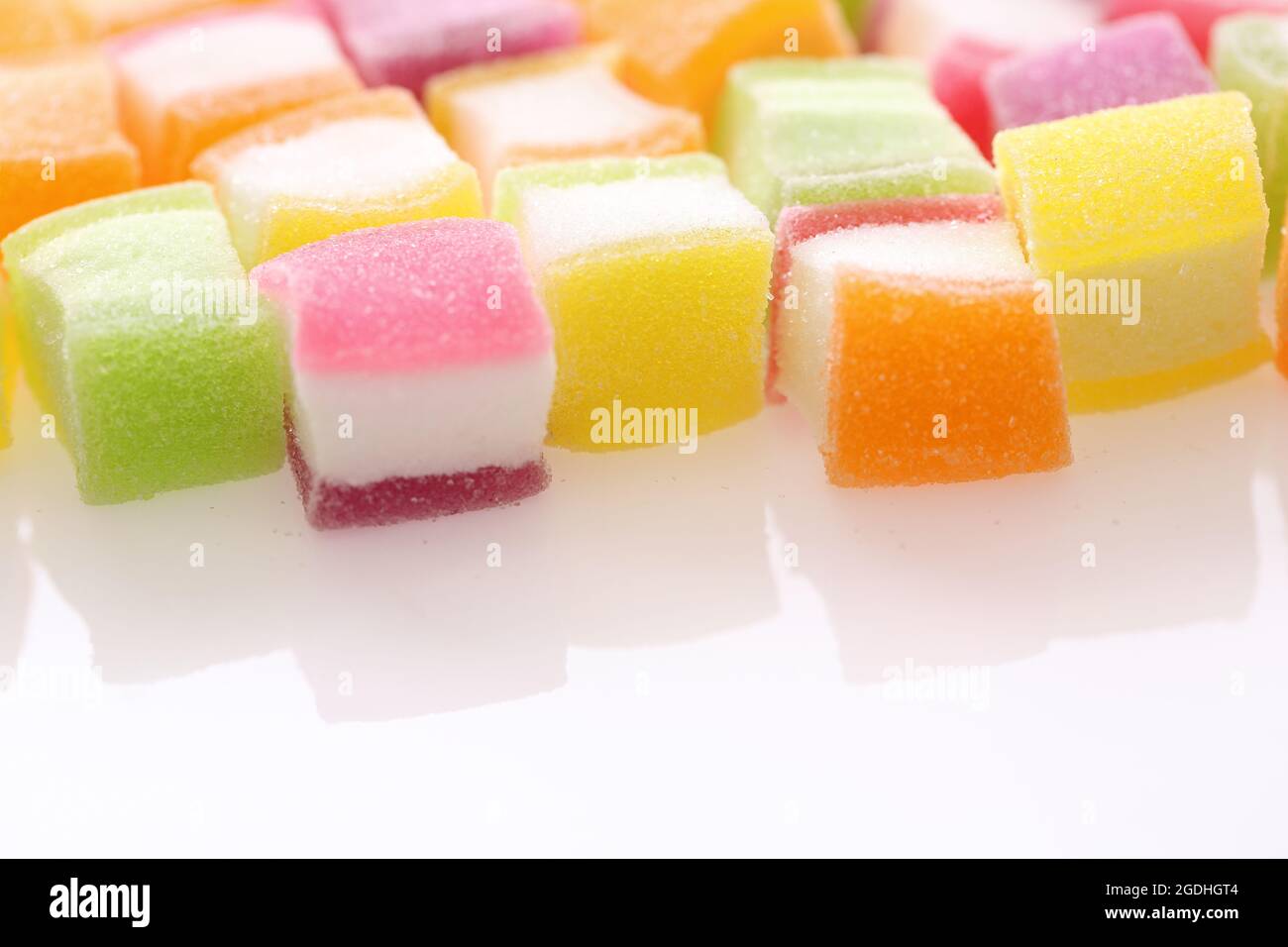 Colorful cube jelly candy isolated in white background Stock Photo - Alamy