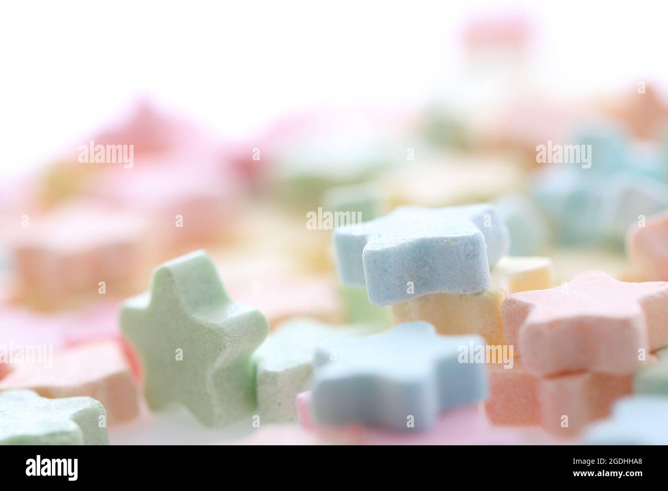 Colourful Star Milk pellets isolated in white background Stock Photo ...