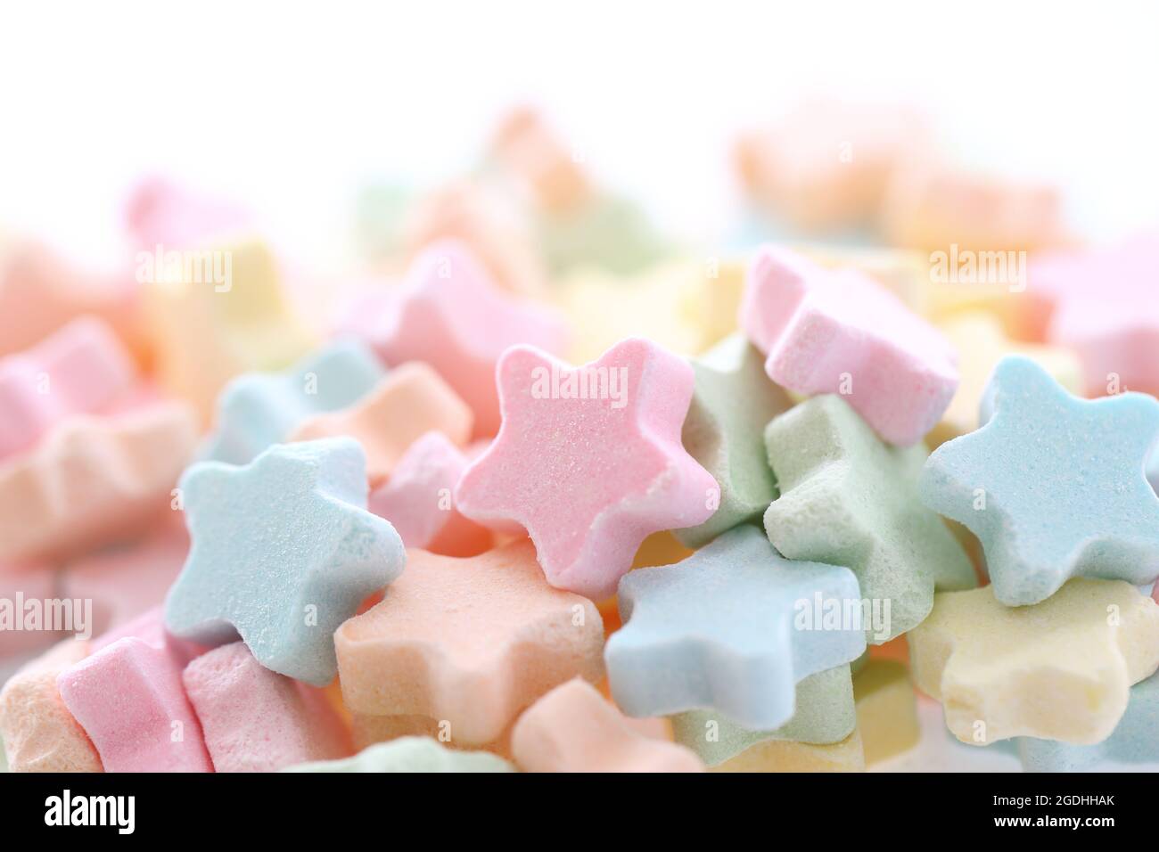 Colourful Star Milk pellets isolated in white background Stock Photo ...