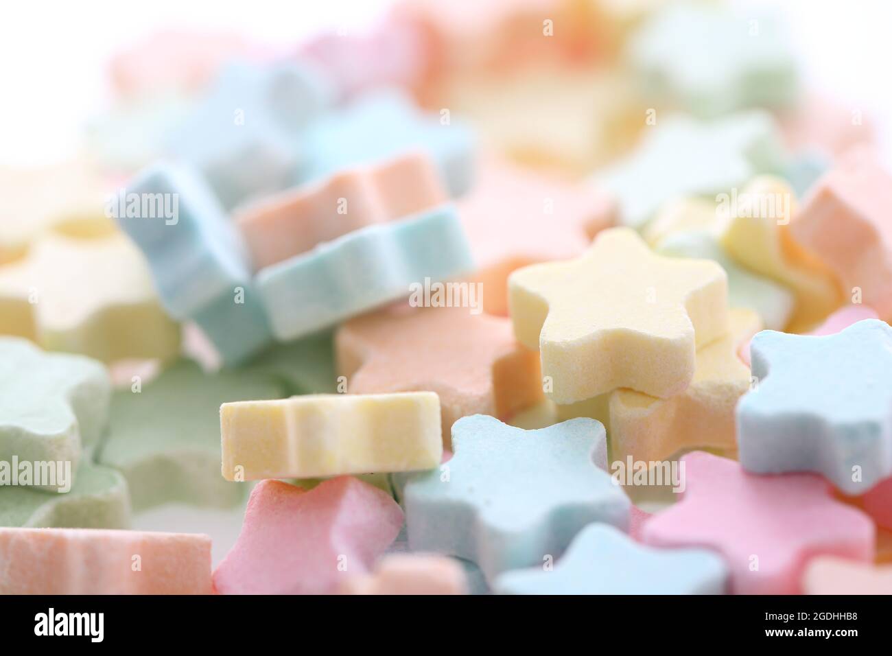 Colourful Star Milk pellets isolated in white background Stock Photo ...