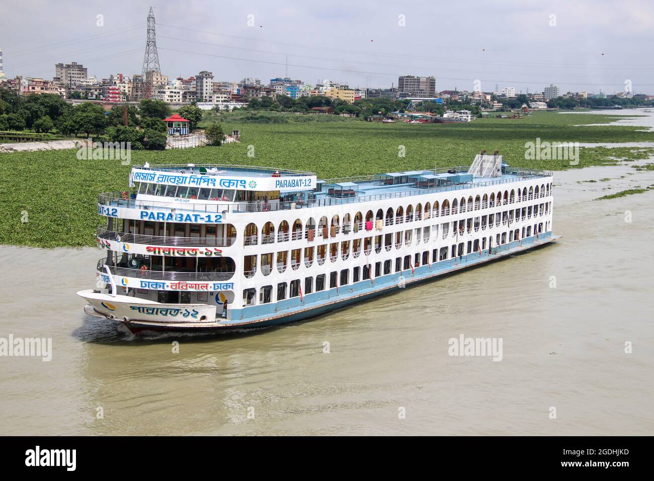 Local Passenger ferry returning to Dhaka river port. Ferry is a very ...