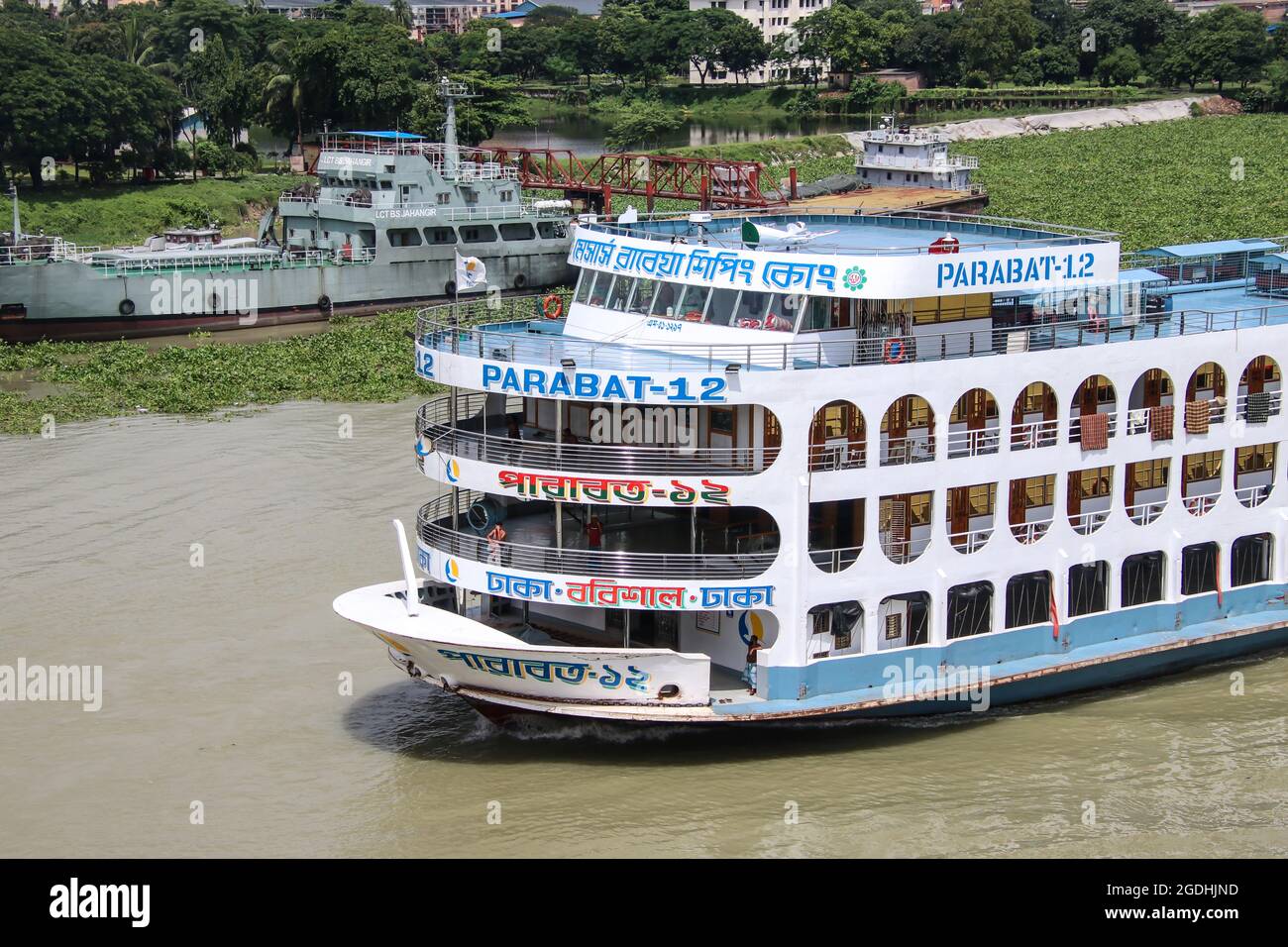 Local Passenger ferry returning to Dhaka river port. Ferry is a very ...