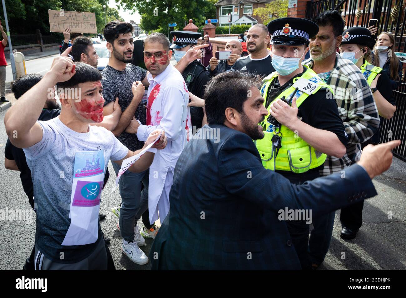 Manchester, UK. 13th Aug, 2021. The police have to intervene during a ...
