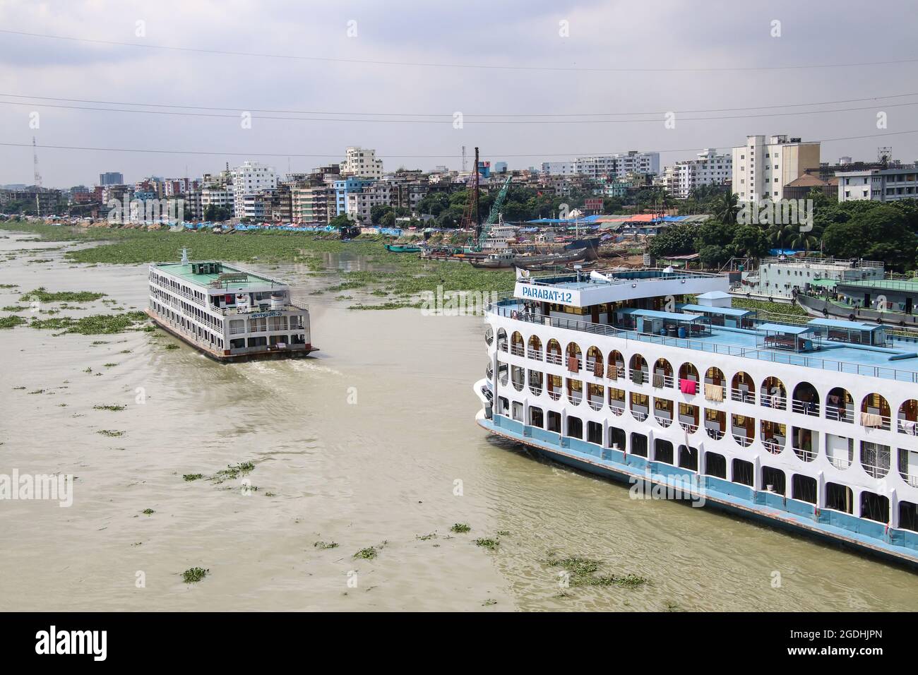 Local Passenger ferry returning to Dhaka river port. Ferry is a very ...