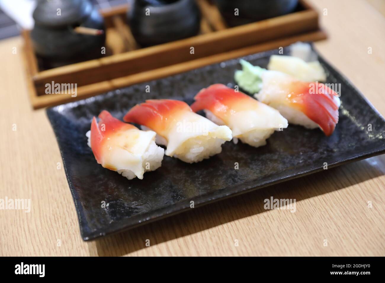 Surf clam nigiri sushi - japanese food style on wood background Stock ...