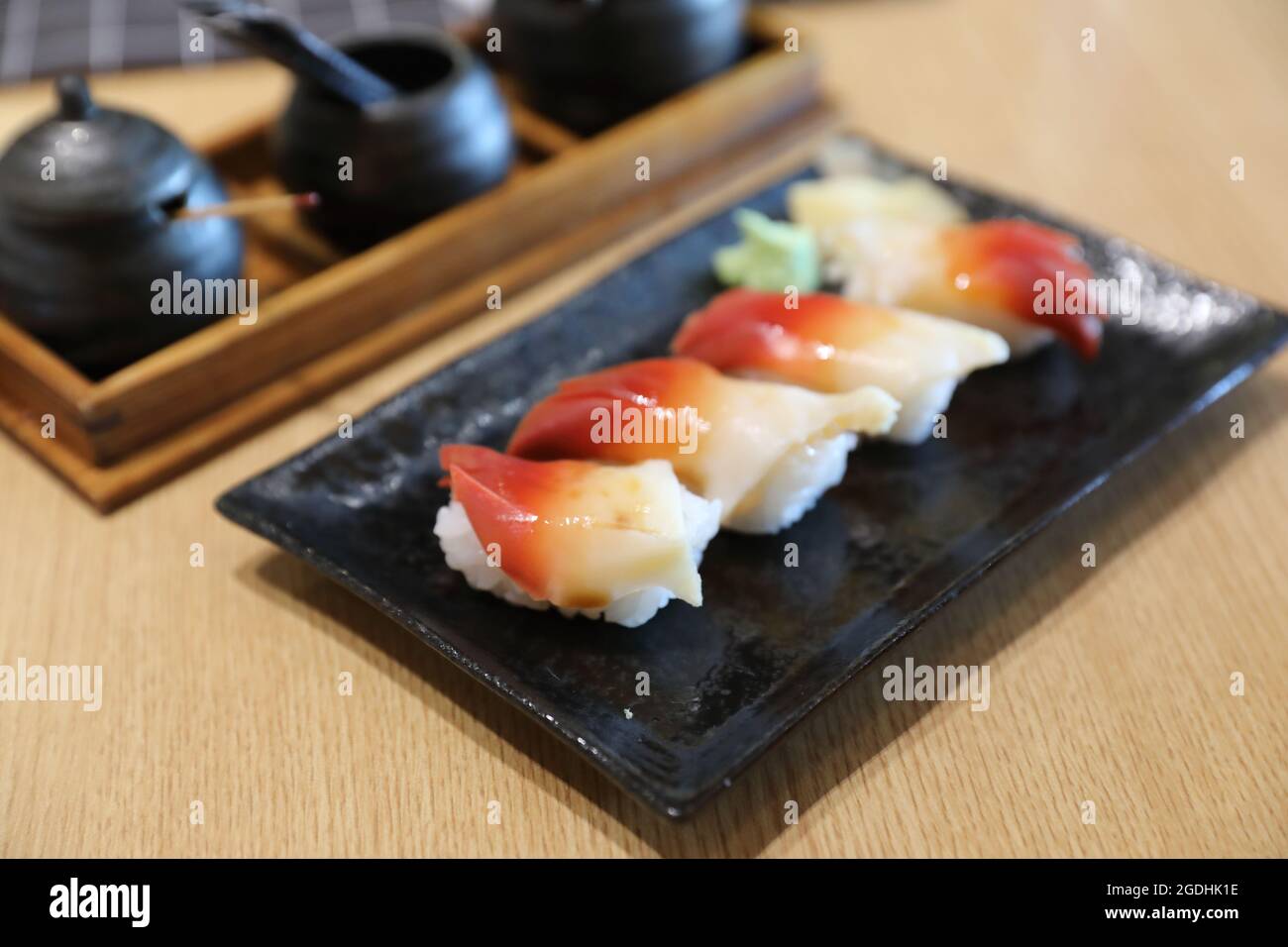 Surf clam nigiri sushi - japanese food style on wood background Stock ...