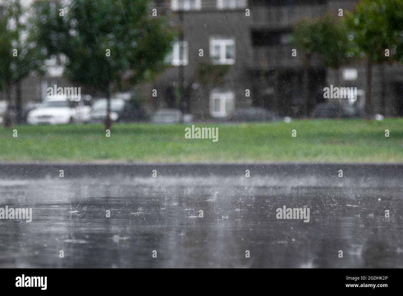 Heavy rain, close-up of splashing and flying drops with an inverted ...
