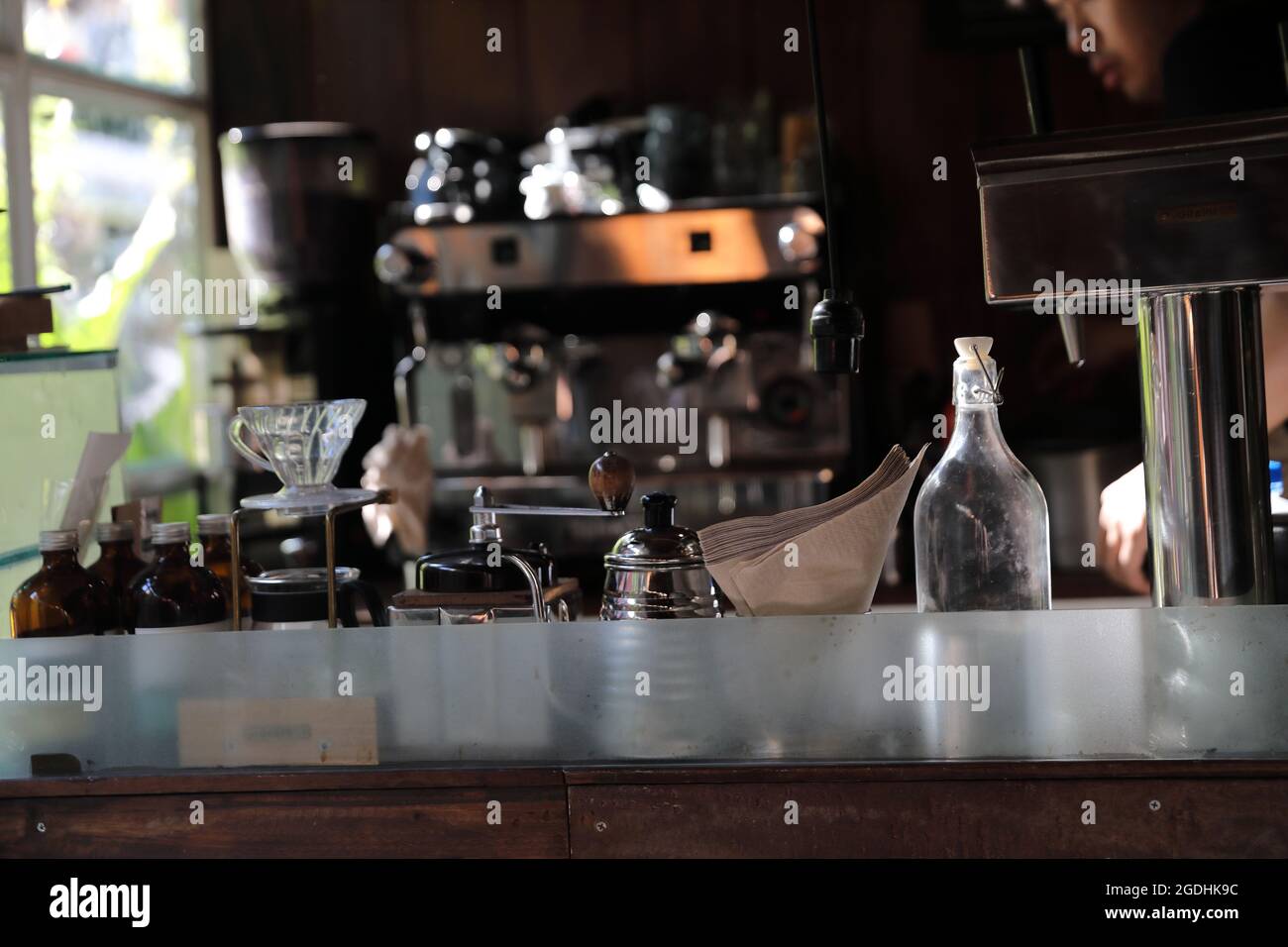 Barista Making Coffee in cafe with coffee machine Stock Photo - Alamy