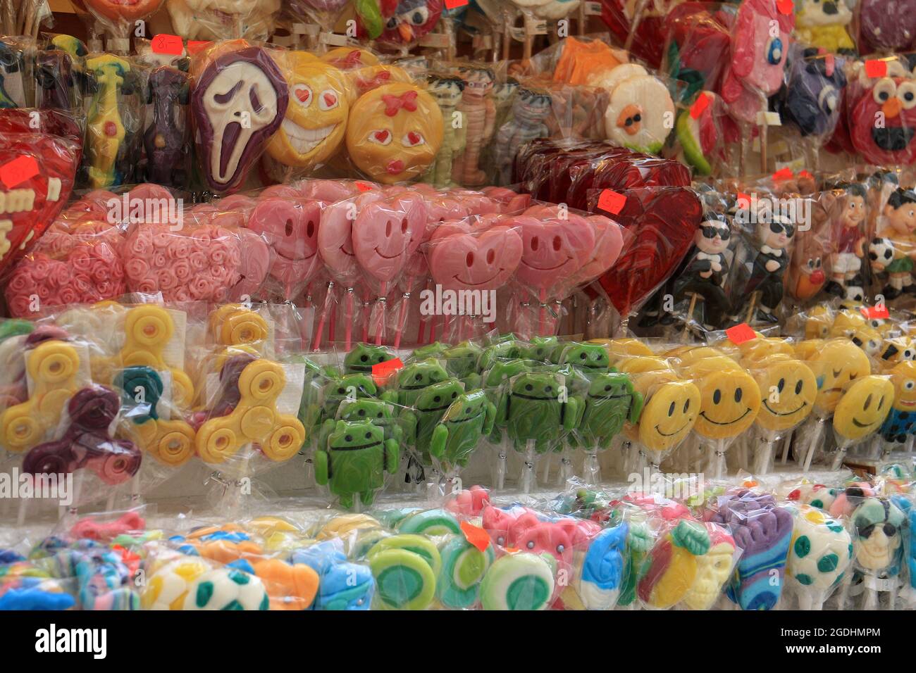 A display of various lollipops in the market Stock Photo - Alamy