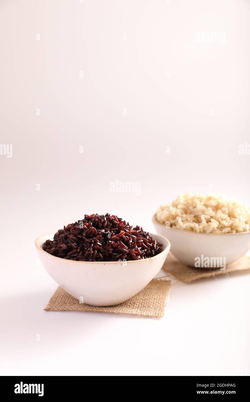 Organic boiled brown rice on bowl isolated in white background Stock ...