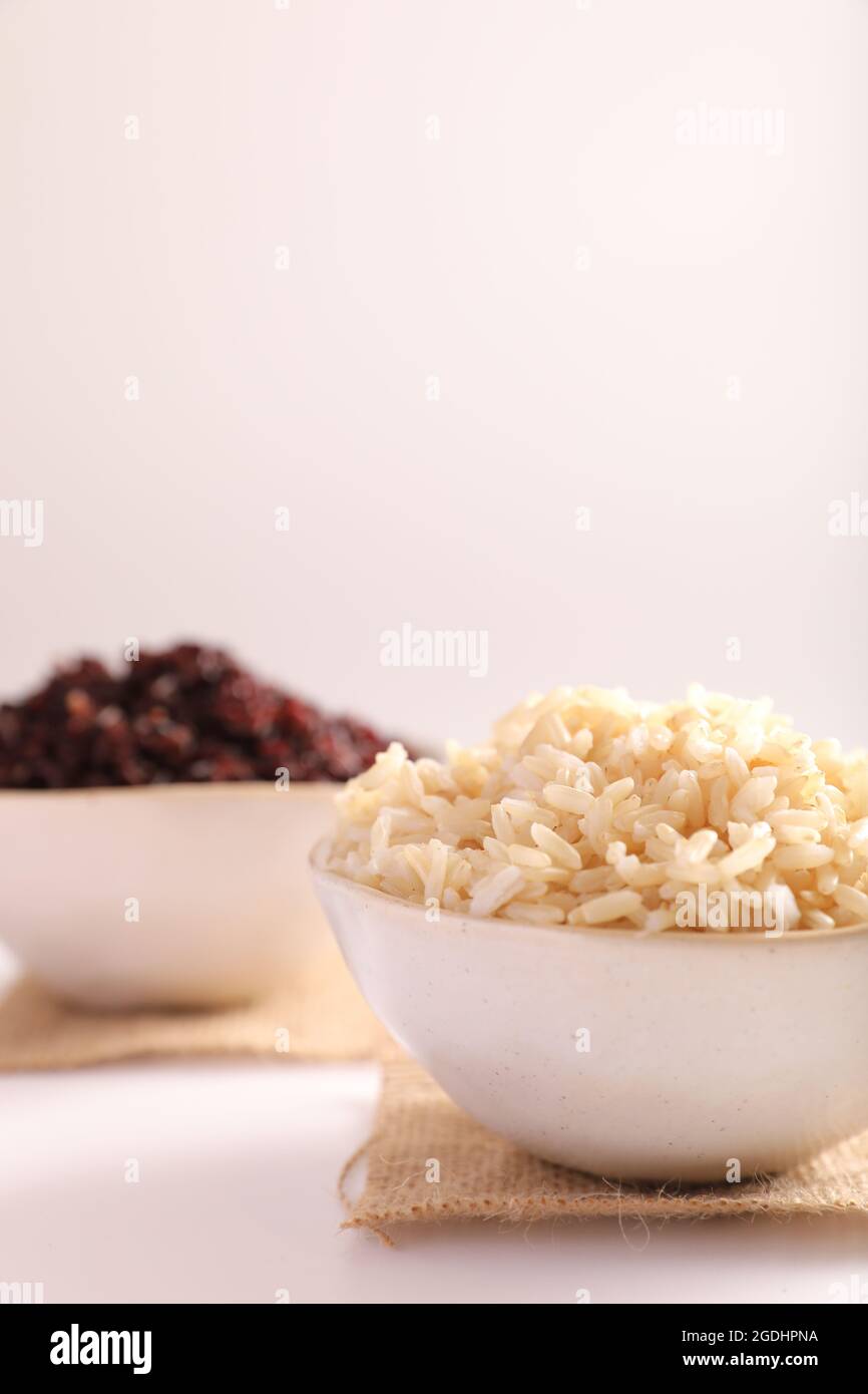 Organic boiled brown rice on bowl isolated in white background Stock ...