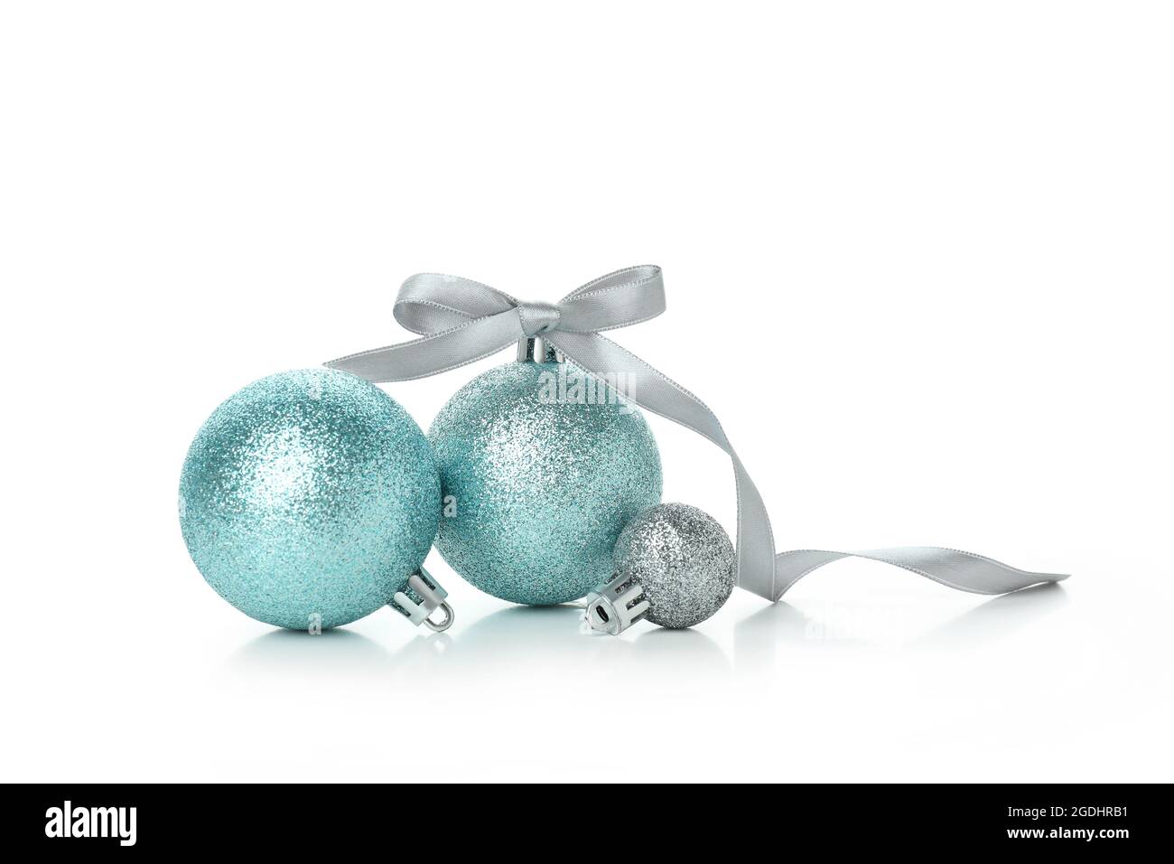 Three Christmas baubles isolated on white background Stock Photo - Alamy