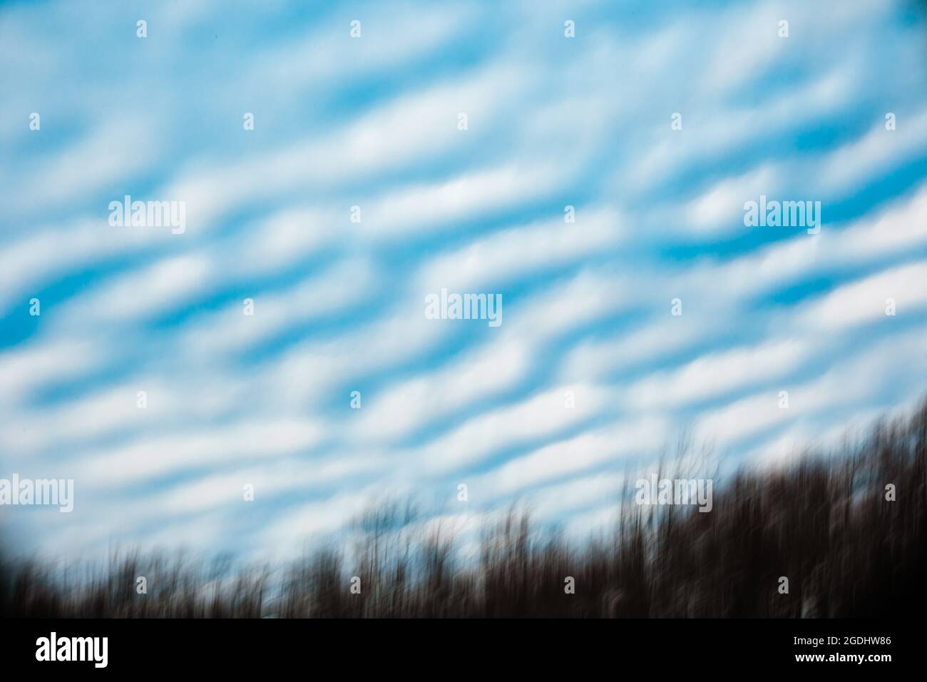 Blue morning sky filled with beautiful clouds during Spring Stock Photo ...