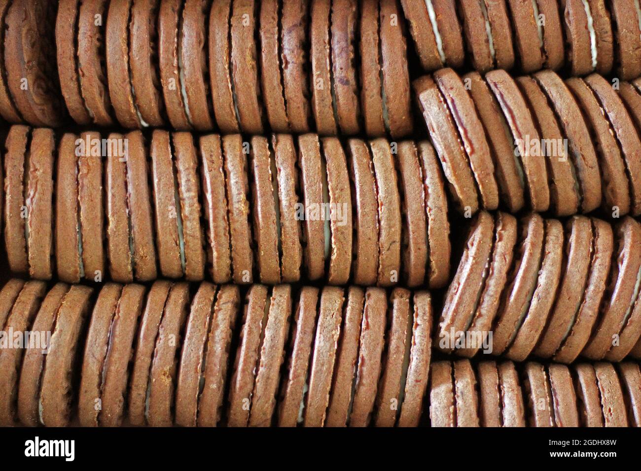 Chocolate double cookie background. Filled cookies Stock Photo - Alamy