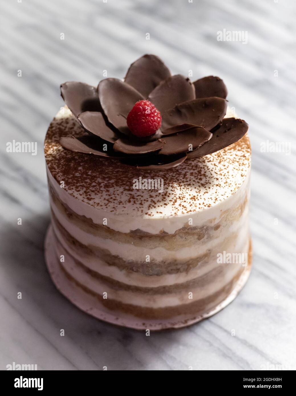 chocolate lotus on tiramisu layer cake Stock Photo - Alamy