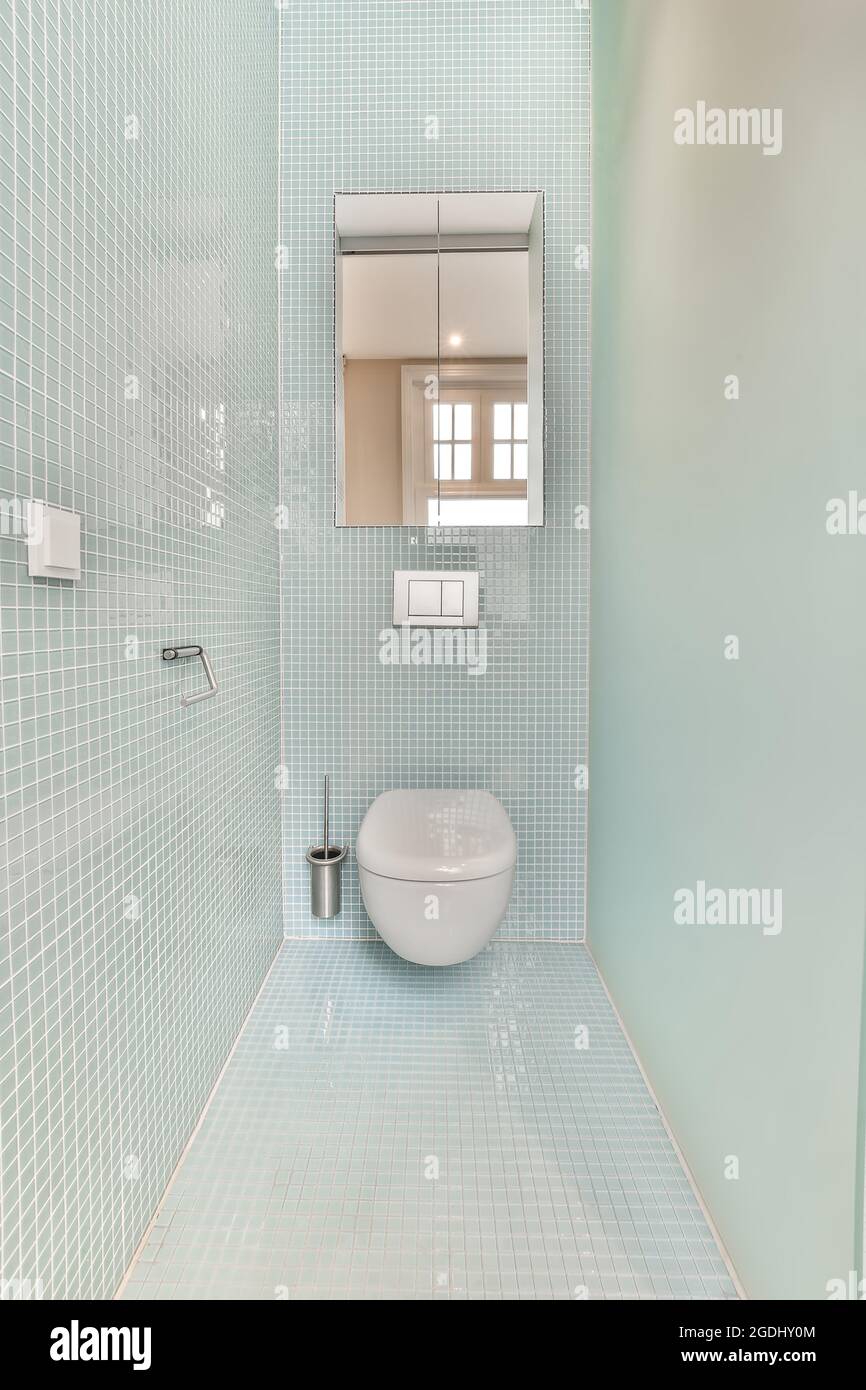 Interior of small clean washroom in miniature style Stock Photo - Alamy
