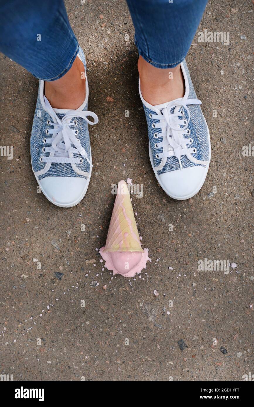 Ice cream fell on asphalt top view Stock Photo - Alamy