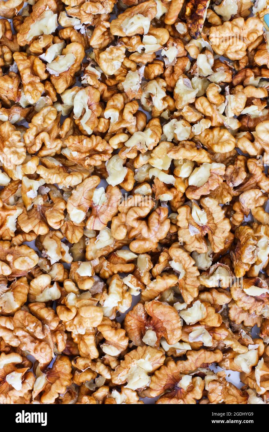 Walnuts background. Brown background. Edible texture Stock Photo - Alamy