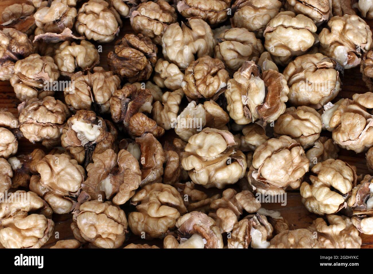 Walnuts background. Brown background. Edible texture Stock Photo - Alamy