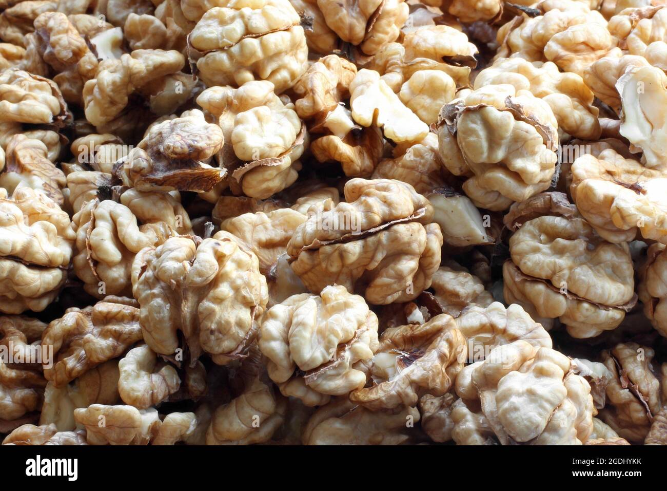 Walnuts background. Brown background. Edible texture Stock Photo - Alamy