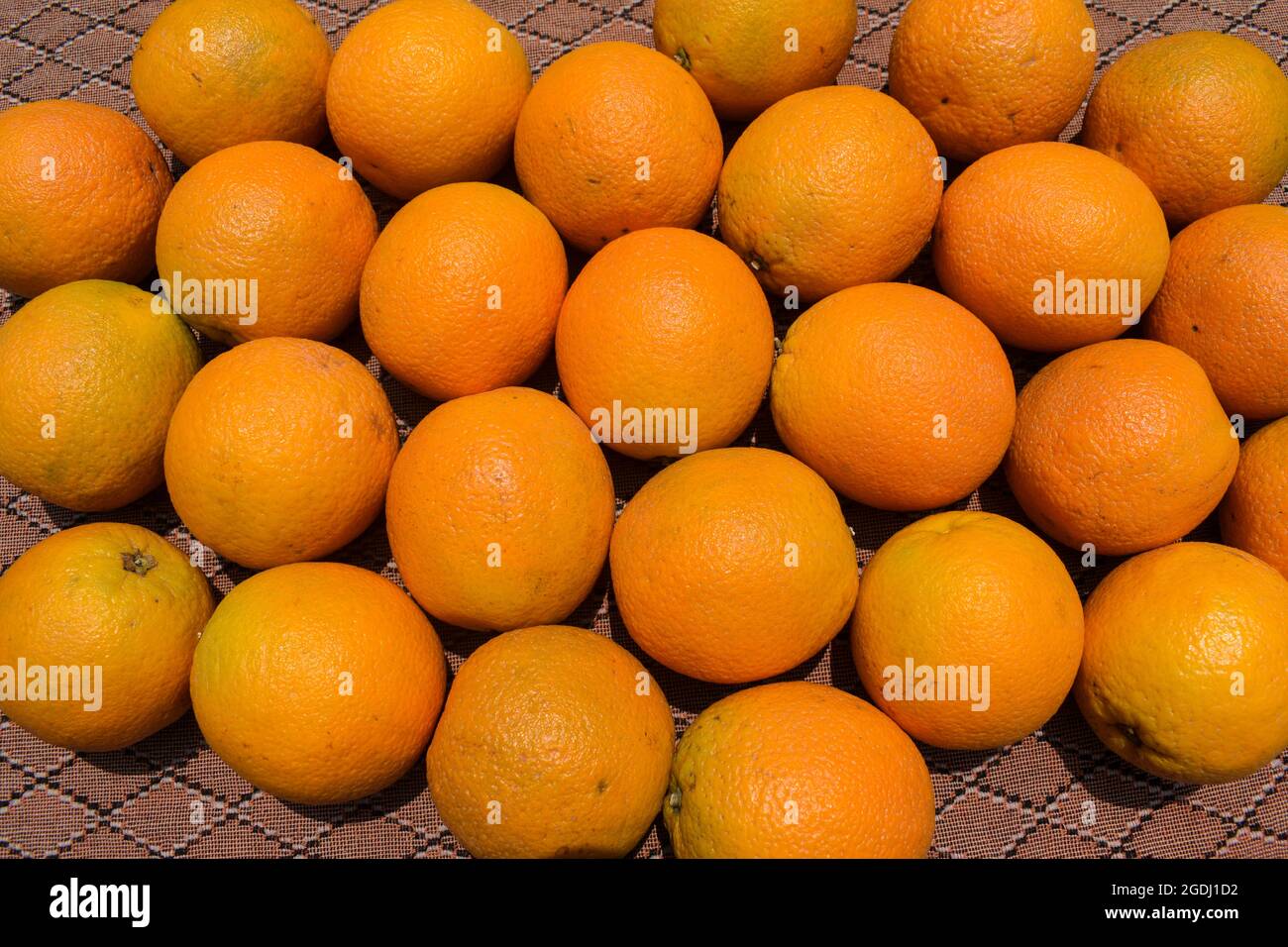 Farm fresh heaps of Citrus fruits Maltas in wicker basket. Organic ...