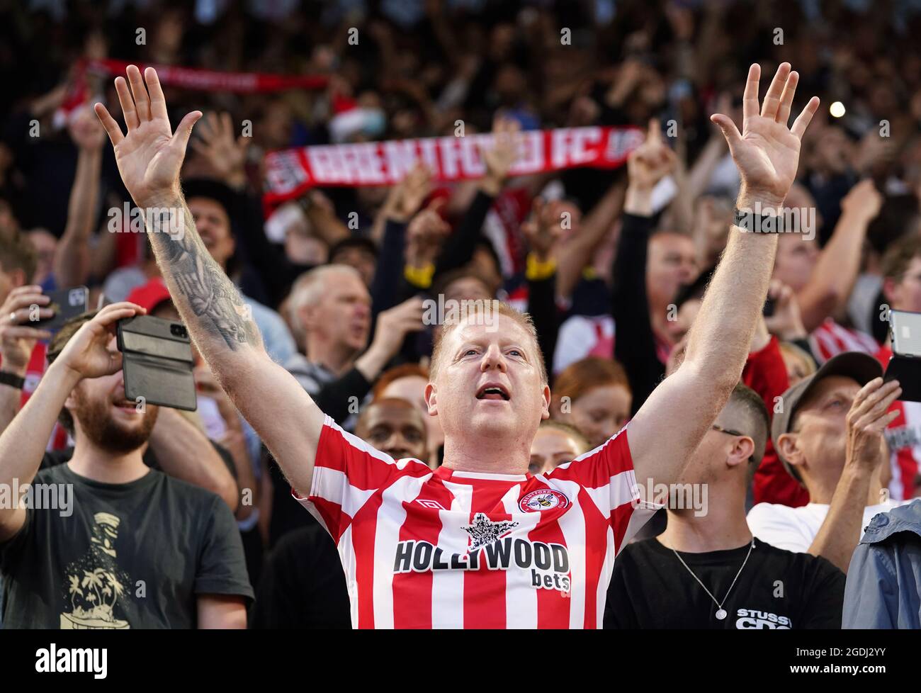 Brentford fans in the stands show their support during the Premier ...