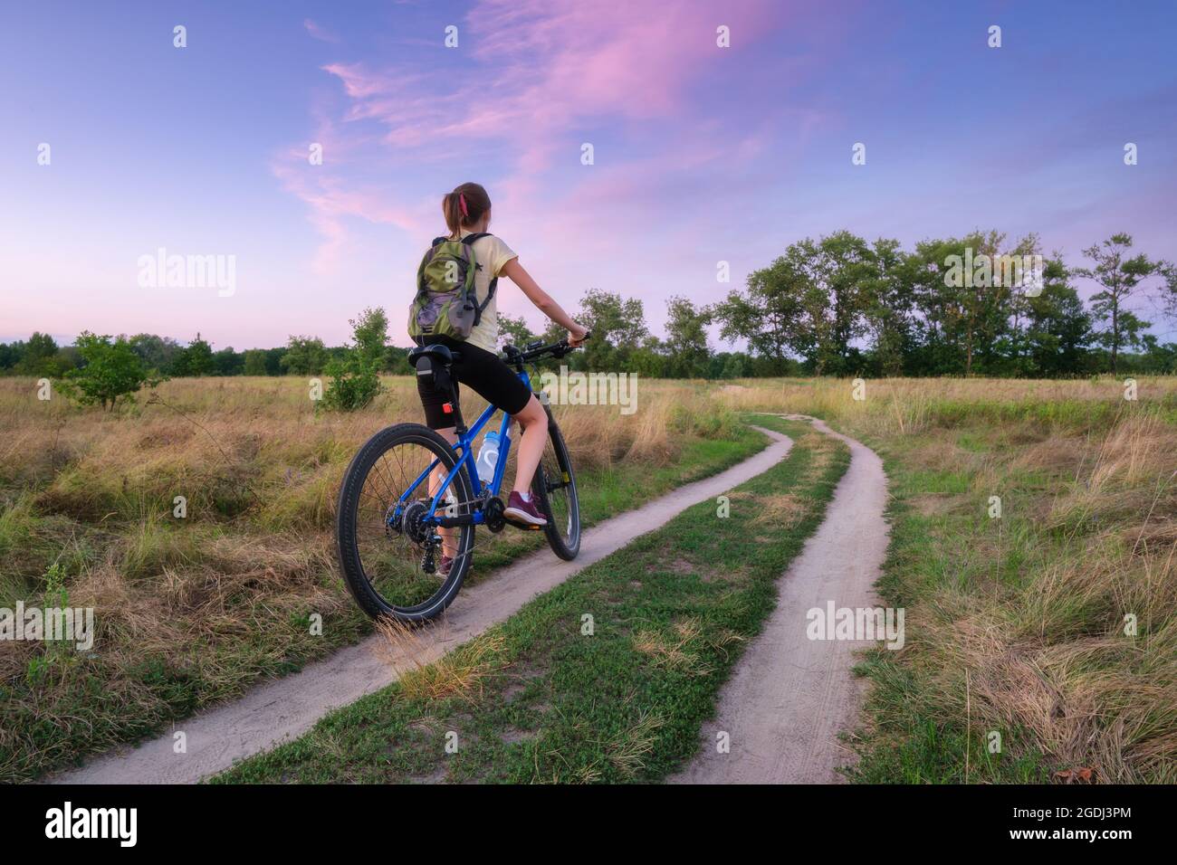 Person riding a road bike hi-res stock photography and images - Alamy